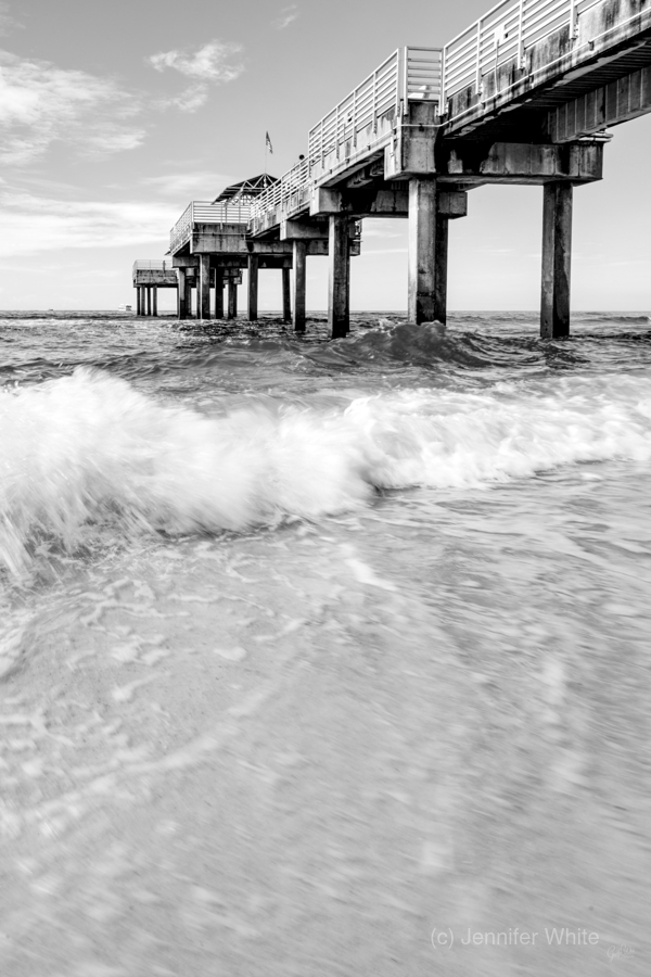 Orange Beach Pier Splashing Waves Grayscale by Jennifer White Wall Art