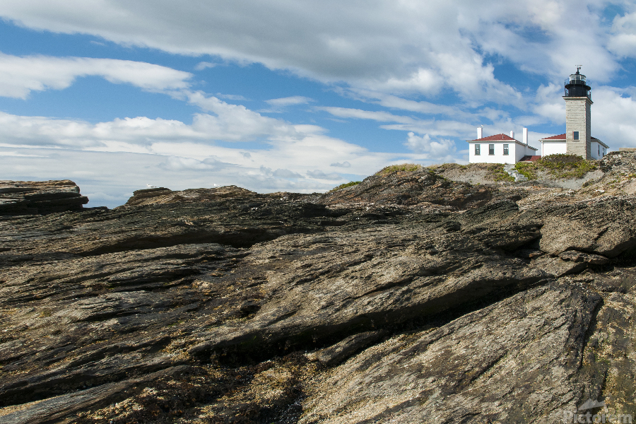 Beavertail Lighthouse Over Unique Rock Formations by Allan Wood Wall Art