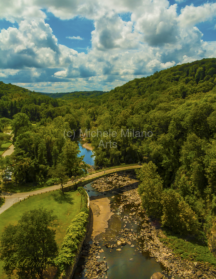 Croton Dam Top View with Huge Fluffy Clouds by Michele Milano Arts Wall Art