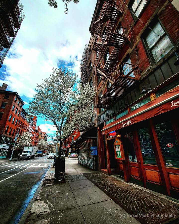 NYC Sullivan Street Corner by BroadMark Photography Wall Art