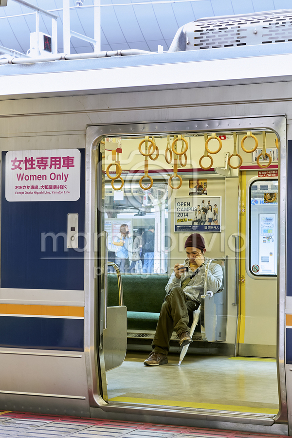 Japan. Kyoto. Train cart for women only by Marco Brivio Wall Art