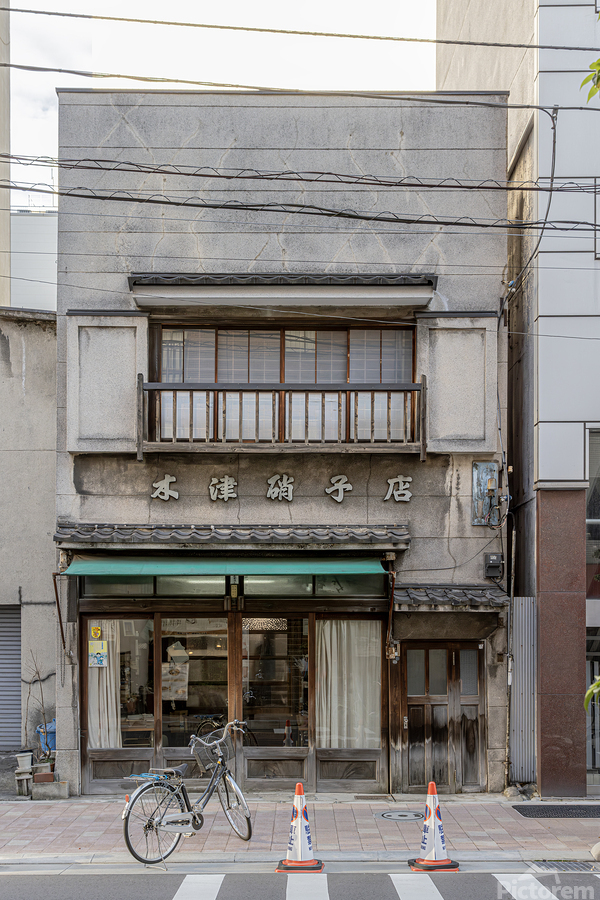Traditional japanese storefront with weathered facade and awning by ...