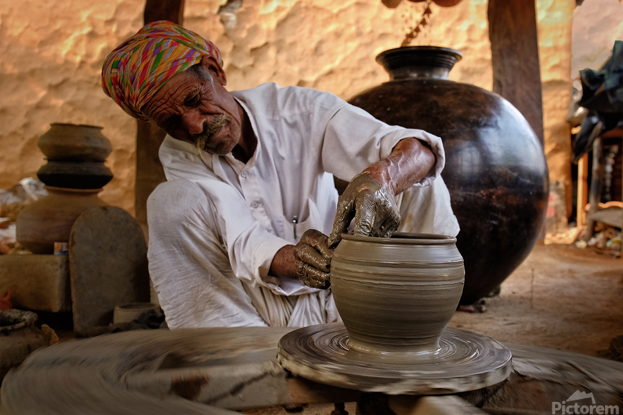 Indian potter at work. Handwork craft from Shilpagram Udaipur Rajasthan ...
