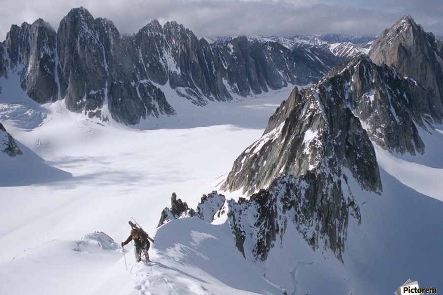 Mountaineer Climbing On Narrow Ridge In Kichatna Mtns Denali National ...