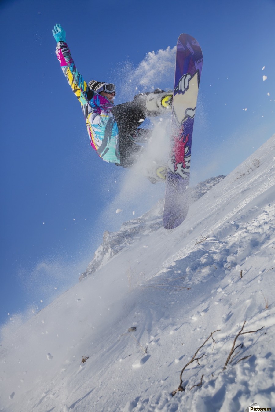 Native Alaskan youth snowboarding in Anaktuvuk Pass, Gates of the ...