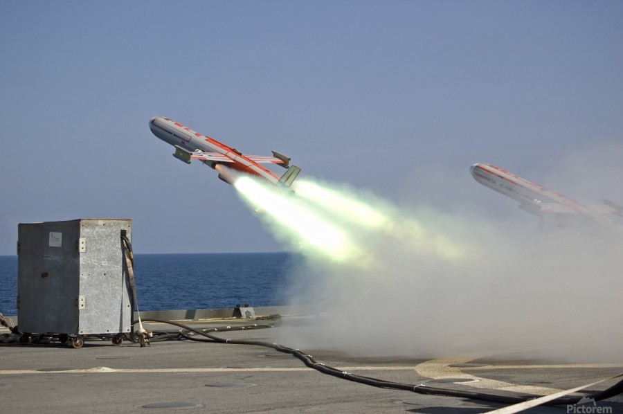 A drone is launched from the amphibious dock landing ship USS Tortuga ...