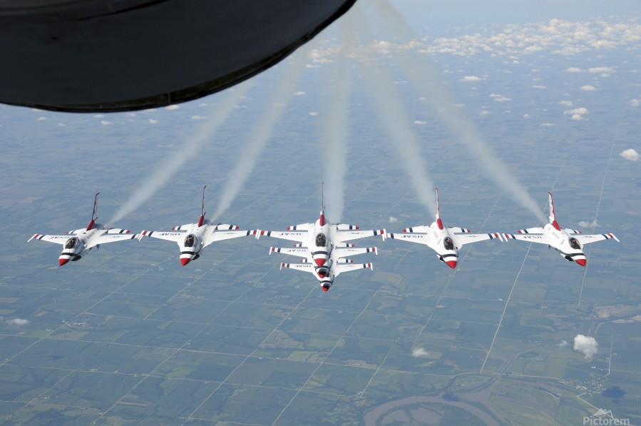The U.S. Air Force Thunderbird demonstration squadron in formation. by ...