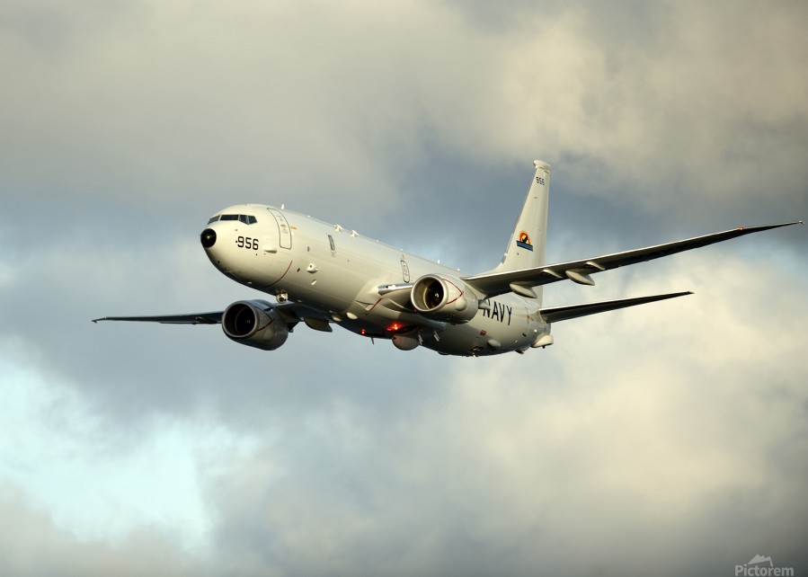 A P-8A Poseidon in flight. by StocktrekImages Wall Art