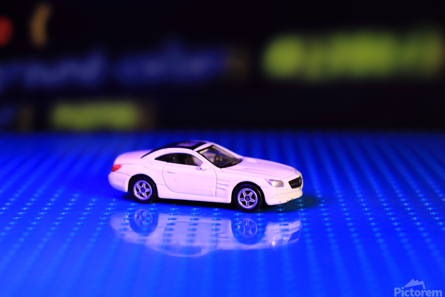 Mercedes toy car blue background by Vasiliu Gabriel Photography Wall Art