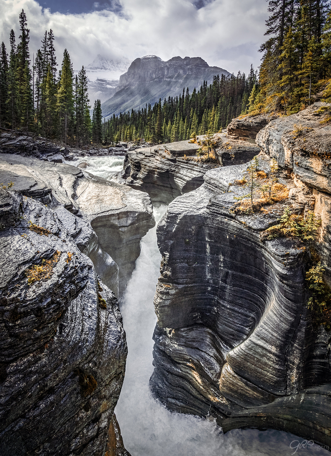 Mistaya Canyon Waterfall by Geoffrey Prior Wall Art