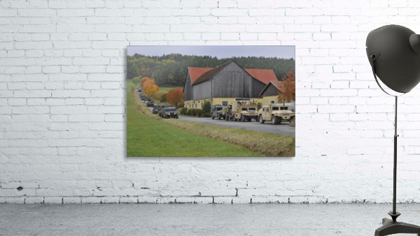 Convoy of U.S. Army vehicles in Amberg Germany. by StocktrekImages Wall Art