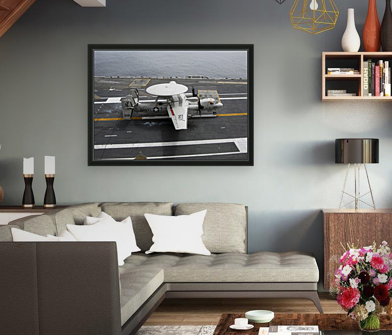 An E-2C Hawkeye makes an arrested landing aboard USS George Washington ...